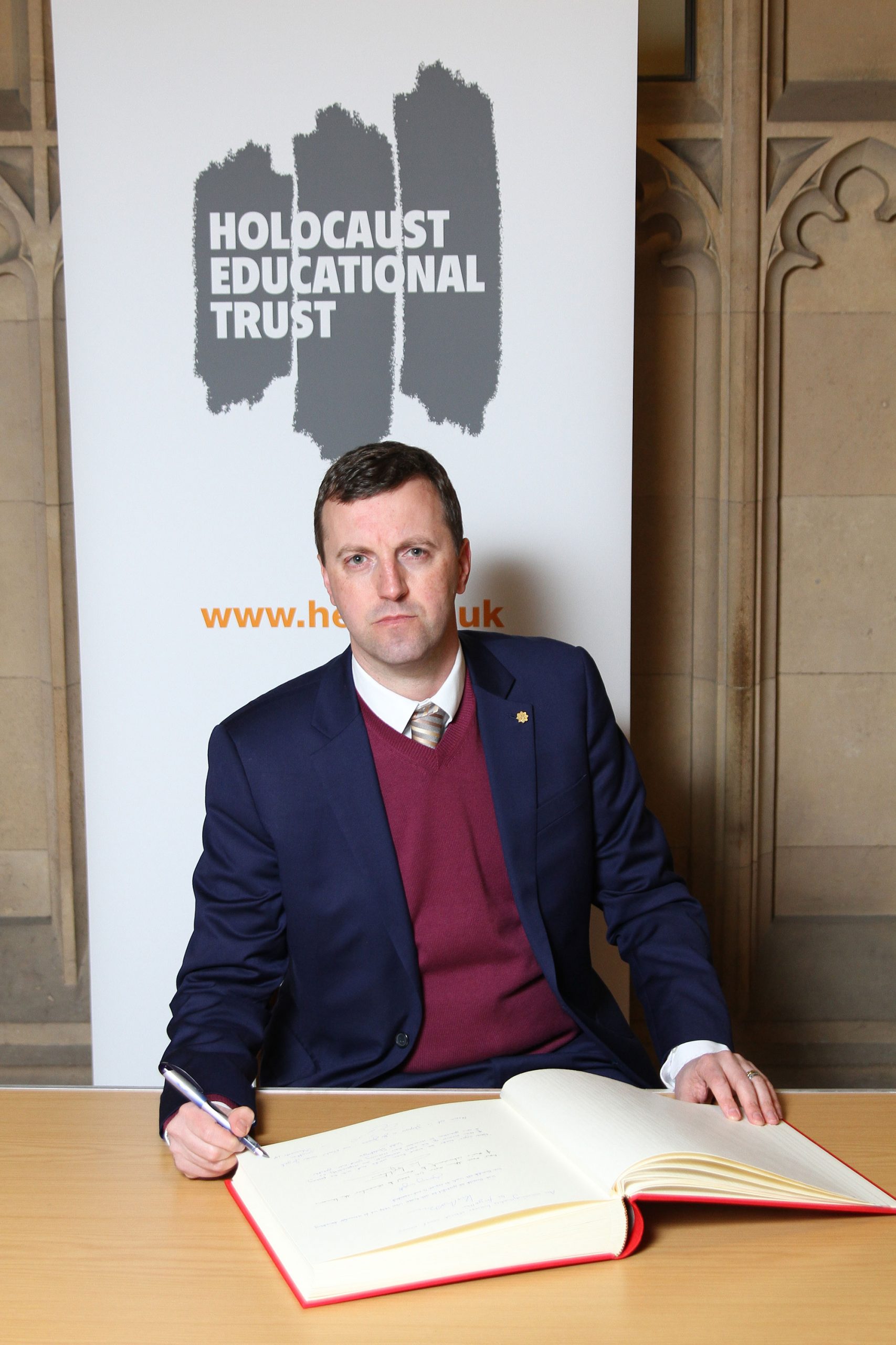 MP signs Holocaust Educational Trust Book of Commitment - Herald.Wales