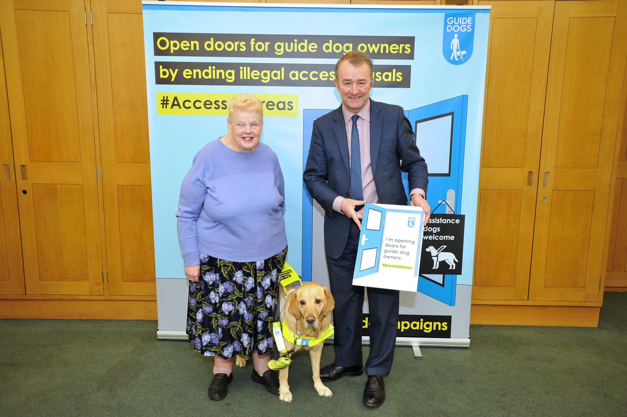 MP helps open doors for guide dogs - Herald.Wales