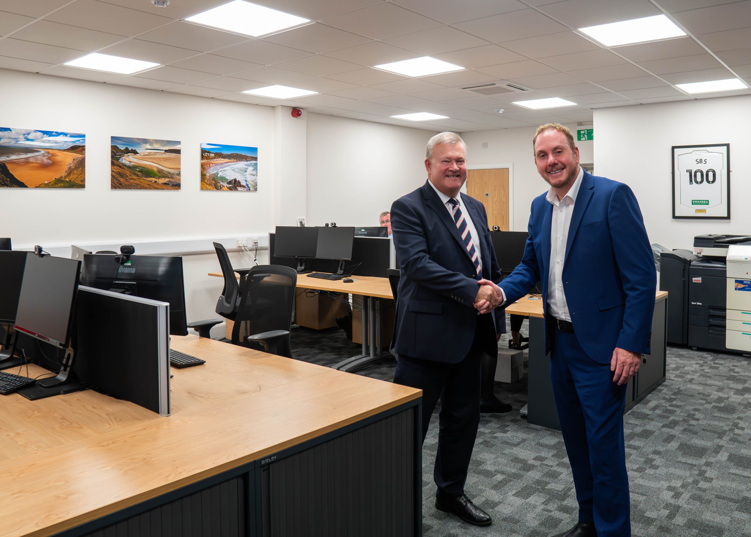 Building society welcomes councillor for unveiling of head office ...