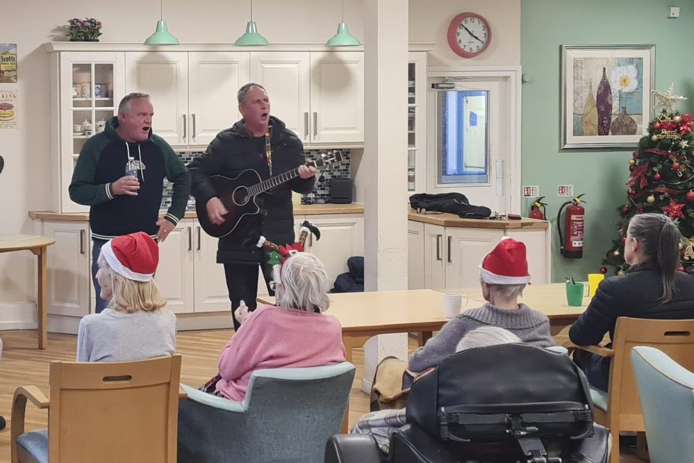 Wrexham folk heroes Declan Swans bring festive cheer to care home ...